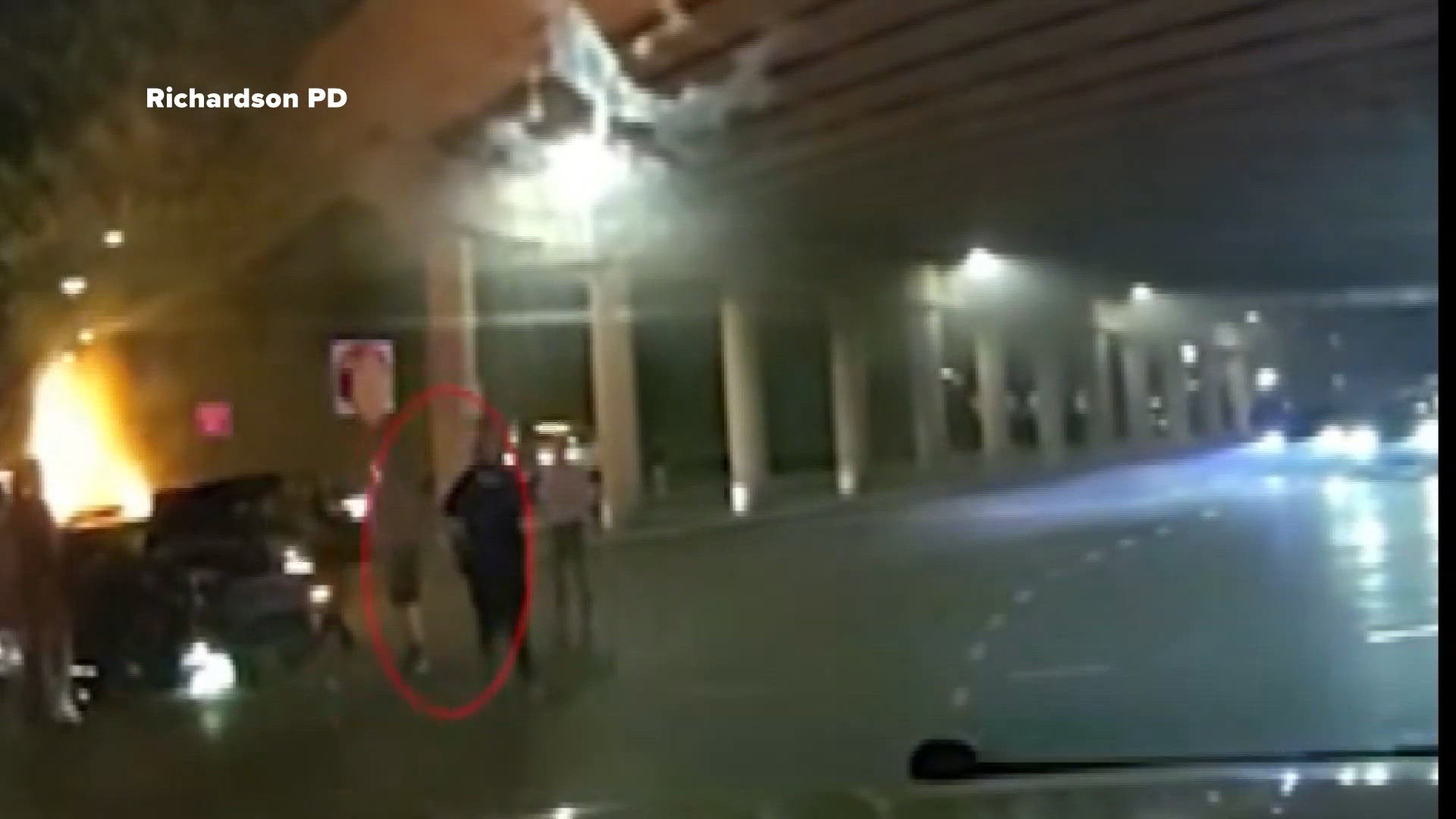 Dramatic video shows Texas police save driver pinned in a burning car ...