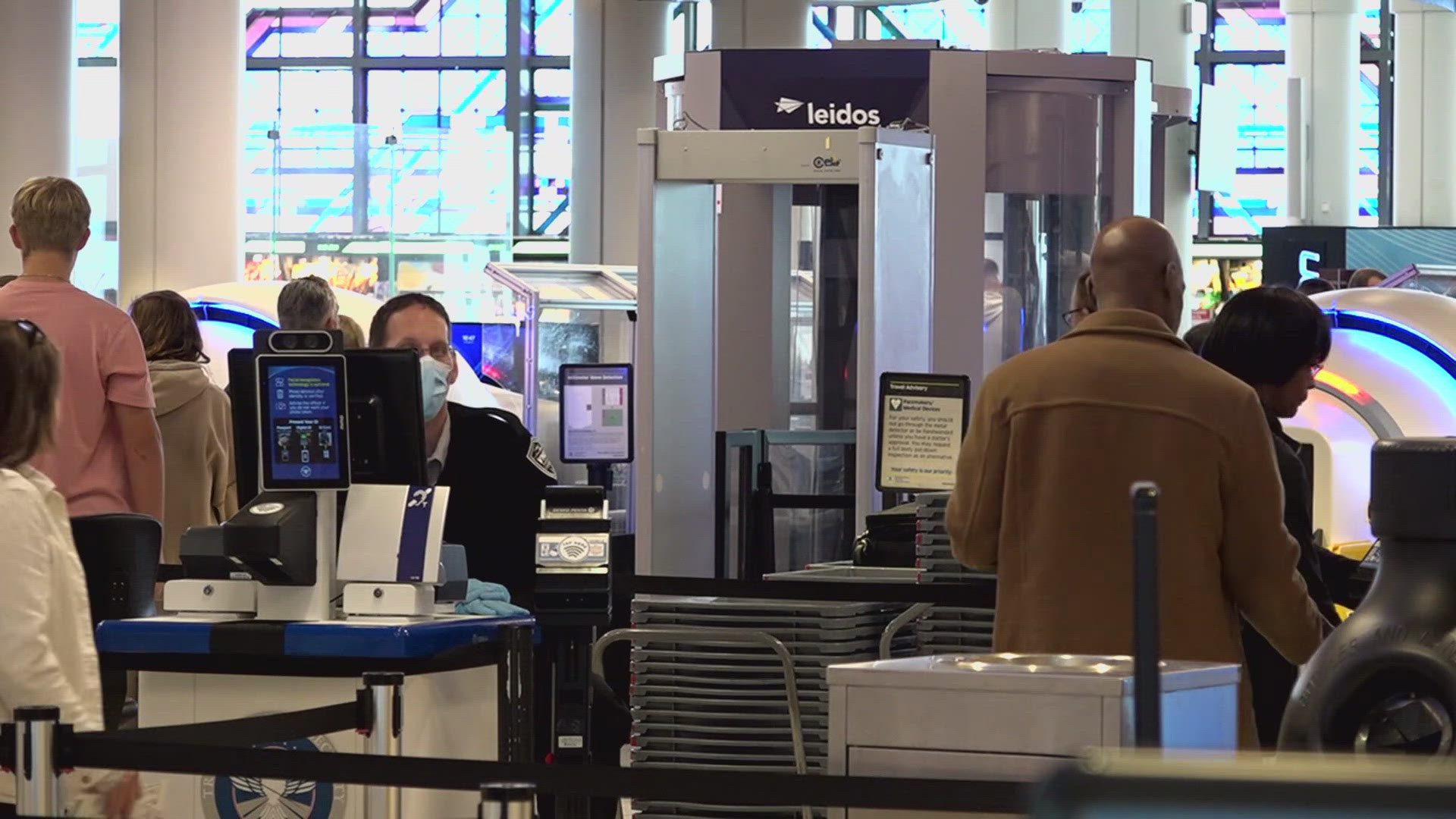 Private security assisting TSA lines at Frederick Douglass airport in ...
