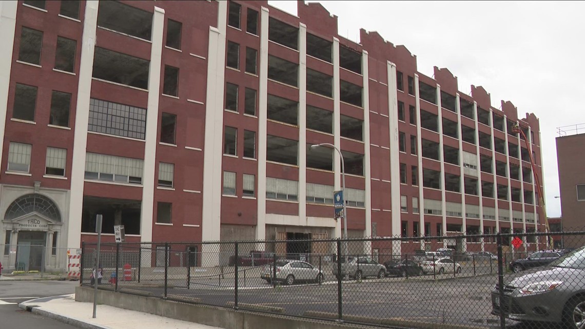 Construction resumes at Trico Building site, project balloons to $112M ...