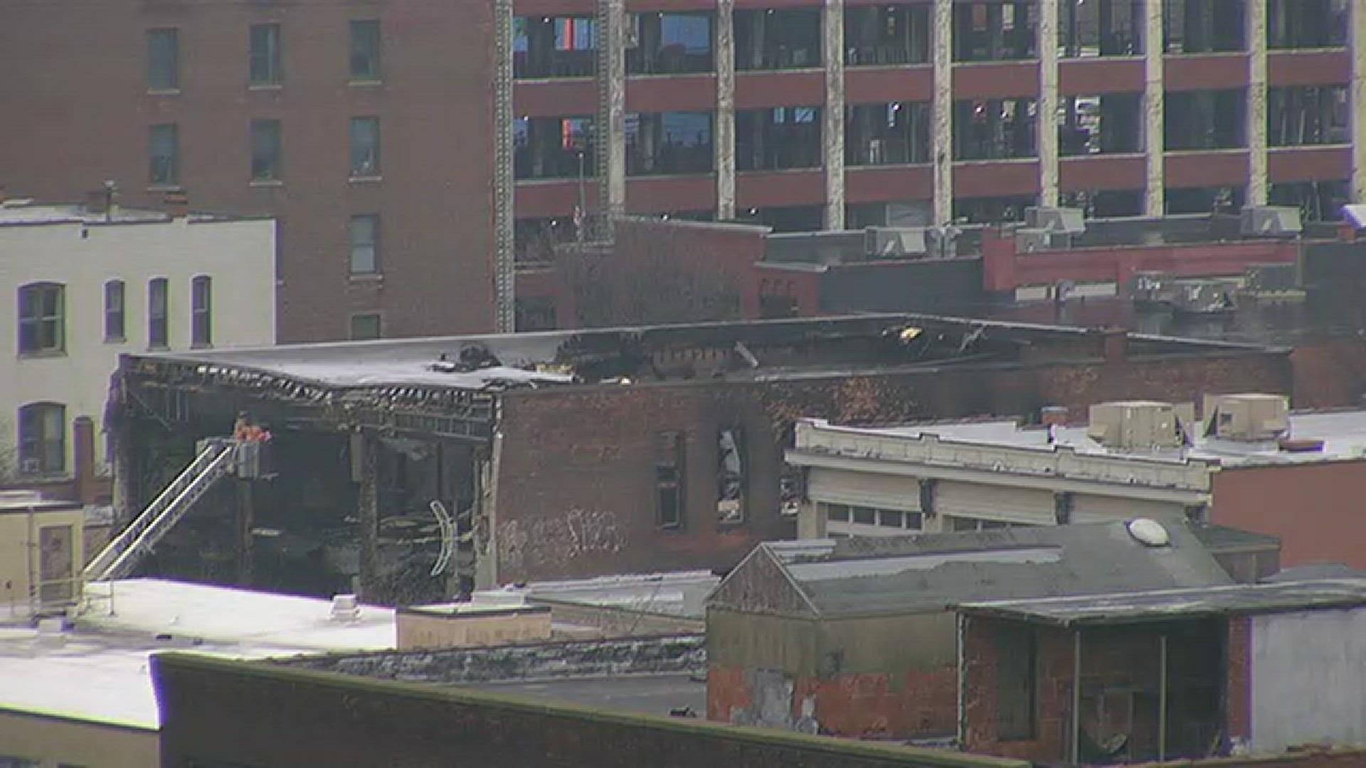 Buffalo Firefighters hang flag to honor fallen firefighter Jason Arno ...