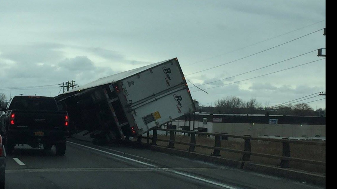 Tractor-trailer ignores ban on Thruway, tips over | wgrz.com