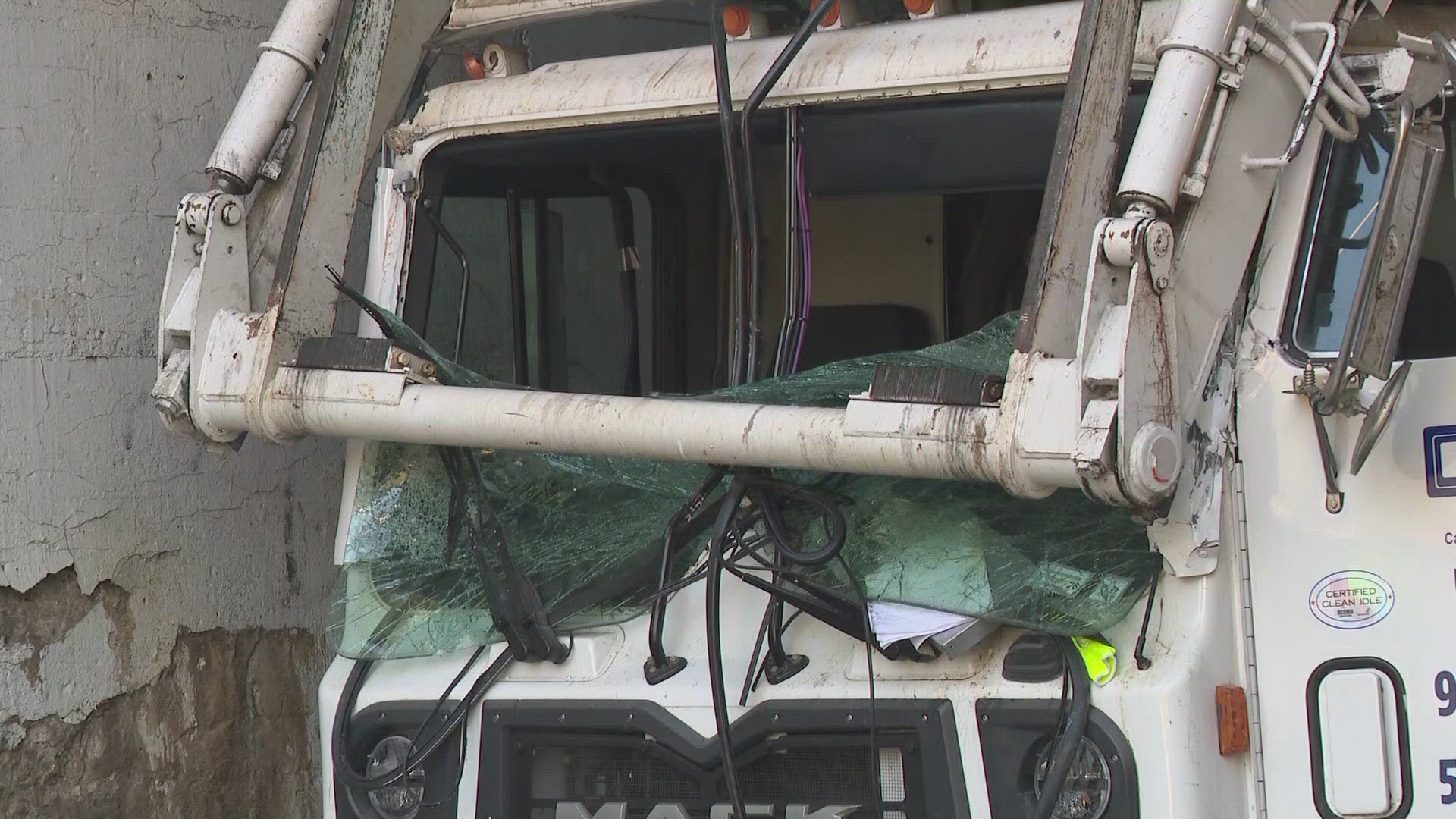 Garbage truck hits railroad bridge on Amsdell Road in Hamburg | wgrz.com