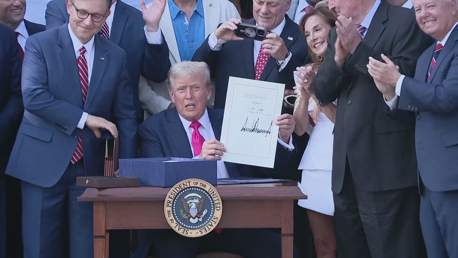 Trump signs his tax and spending cut bill at the White House July 4 ...