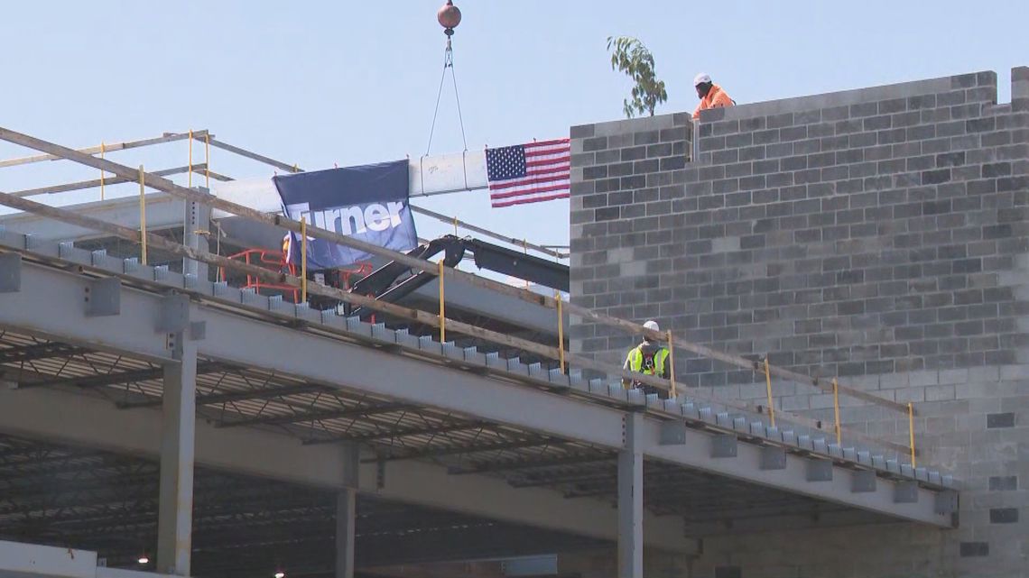 Station Twelve reaches milestone with topping off ceremony in Amherst ...