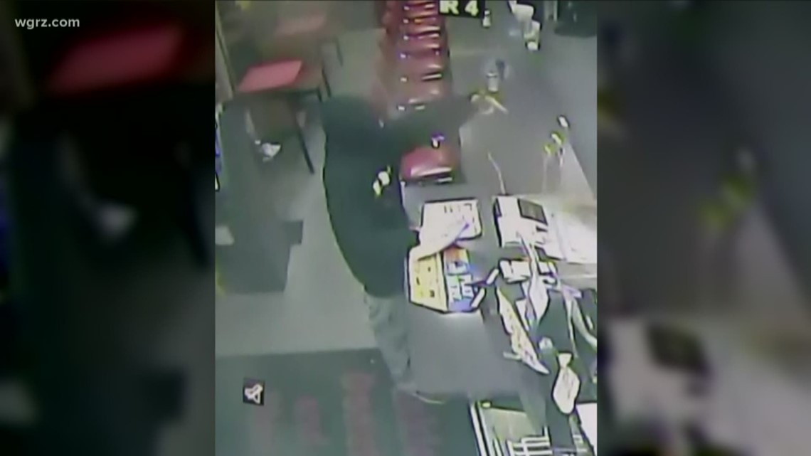 Plastic bag-wearing robbery suspect arrested | wgrz.com
