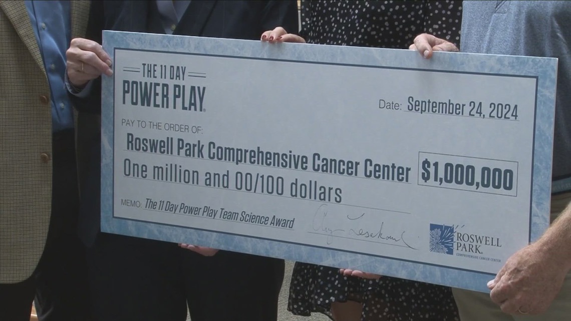 11 Day Power Play presents a check to Roswell Park | wgrz.com