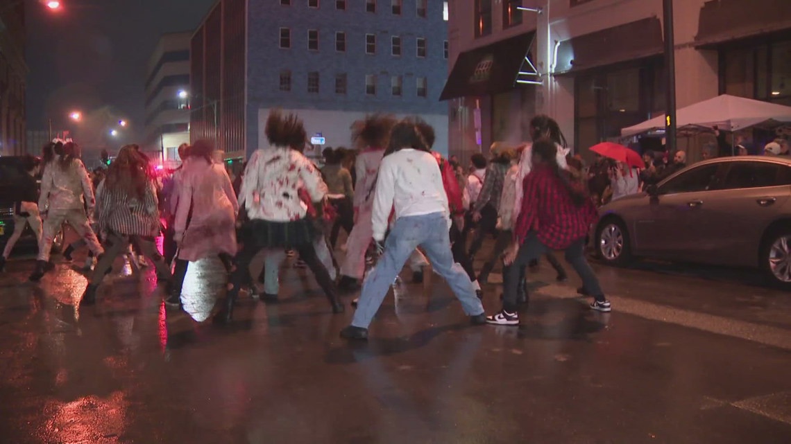 Zombies dance through downtown during 'thrilling' flash mob performance ...