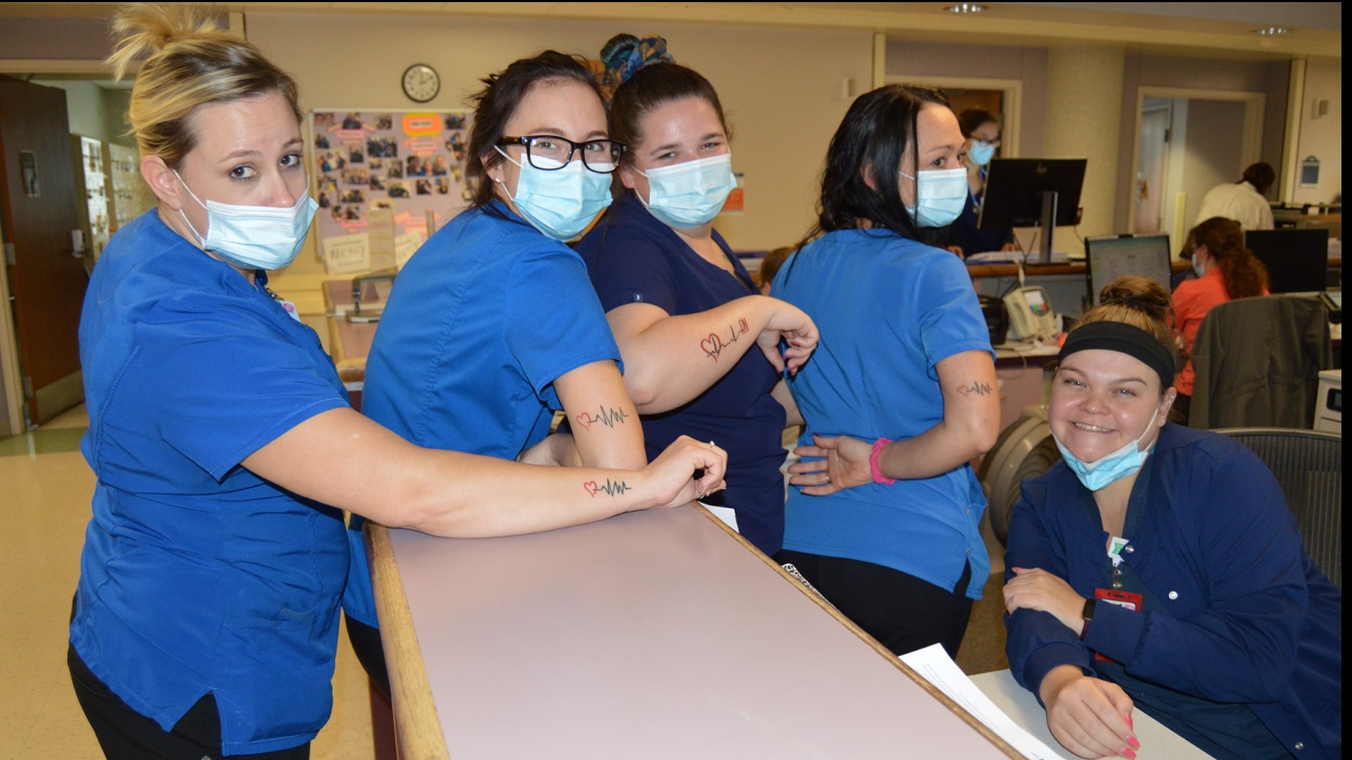 Kenmore Mercy nursing team honors their work with matching tattoos ...